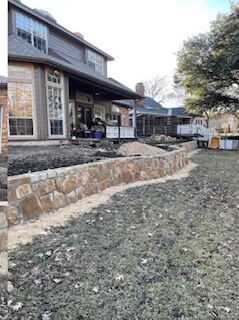 Replacing cross tie wall with milsap wall and adding a patio